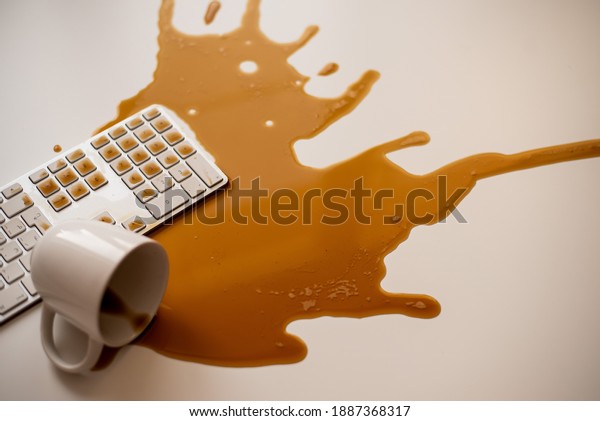 Spilled Black Coffee On Computer Keyboard Stock Photo (Edit Now) 1887368317