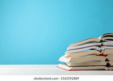 Stack Books Against Blue Background Space Stock Photo 1565592889 ...