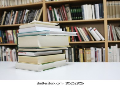 Book Stack On Wood Desk Blurred Stock Photo 1017025384 | Shutterstock