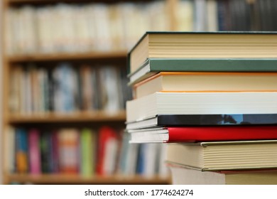 Book Stack On Wood Desk Blurred Stock Photo (Edit Now) 569895262