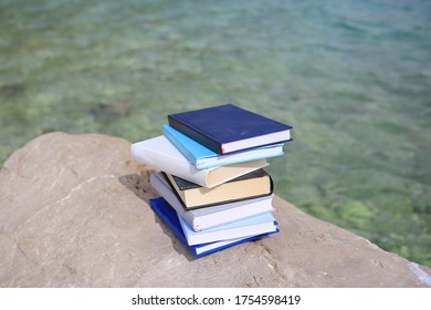 615 Stack Books Beach Images, Stock Photos & Vectors | Shutterstock