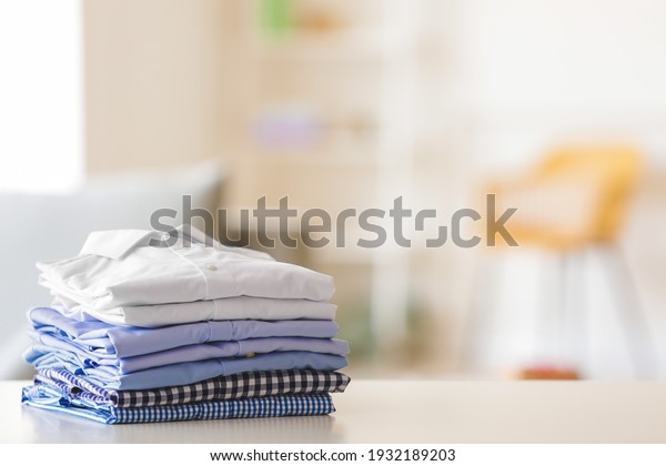 Stack Clean Clothes On Table Room Stock Photo (Edit Now) 1932189203