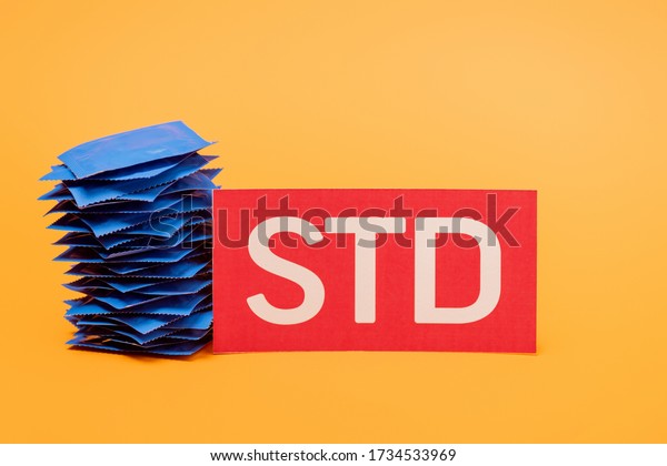 Stack Condoms Near Paper Std Lettering Stock Photo 1734533969 ...