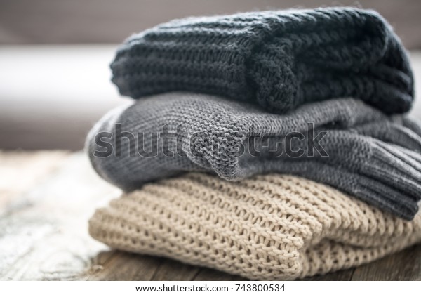 Stack Cozy Knitted Sweaters On Wooden Stock Photo 743800534 | Shutterstock