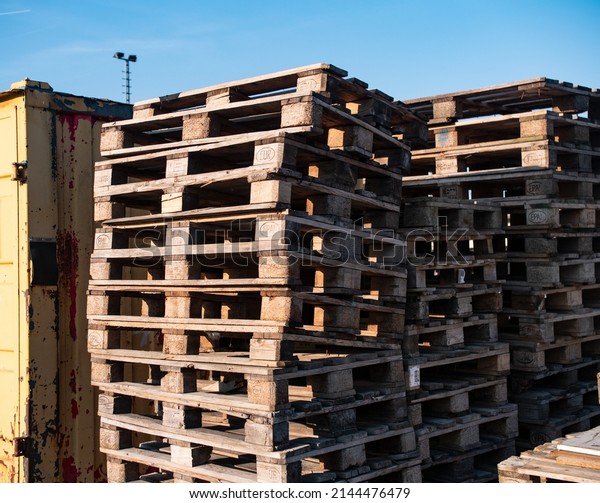 Stack of euro pallets at a freight yard. Transportation and logistics ...