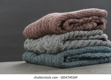 Stack Folded Knitted Sweaters On Gray Stock Photo 1854749269 | Shutterstock