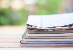 Magazine with open pages up featuring advertisement, background, and ...