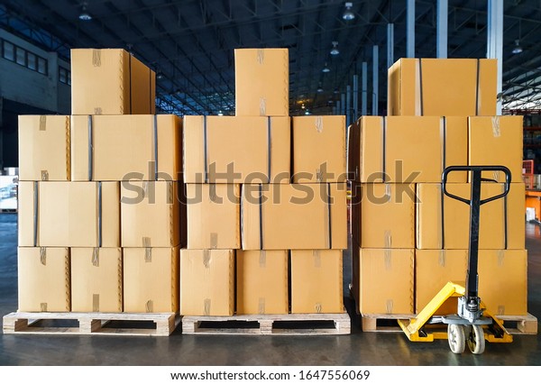 Stack Package Boxes On Wooden Pallets Stock Photo 1647556069 | Shutterstock