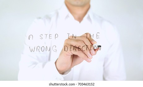 Step Wrong Direction Man Writing On Stock Photo 703463152 | Shutterstock