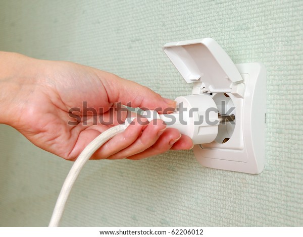 Sticking Electric Plug Socket On Wall Stock Photo (Edit Now) 62206012