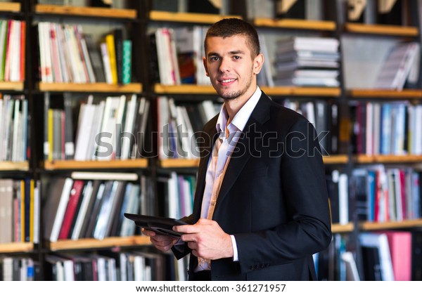 Student Using Tablet Library Student Stands Stock Photo 361271957 ...