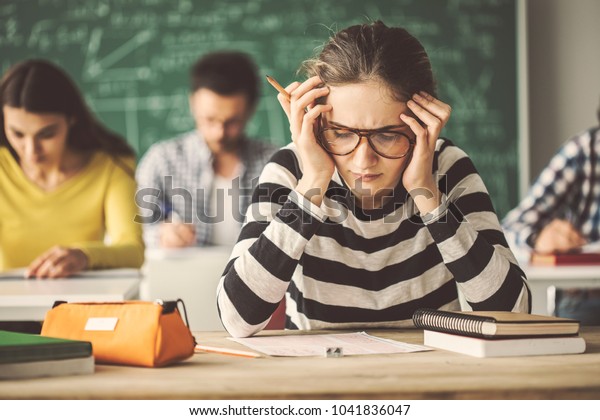 Students Solving Problem Quiz Classroom Behind Stock Photo 1041836047 ...