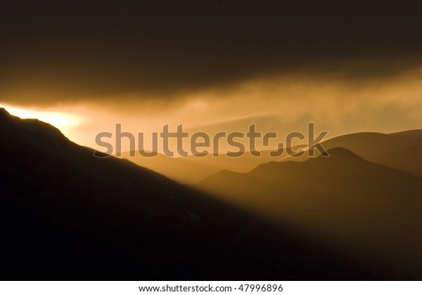 Sun Rays Cut Through Mountains Sunset Stock Photo 47996896 | Shutterstock