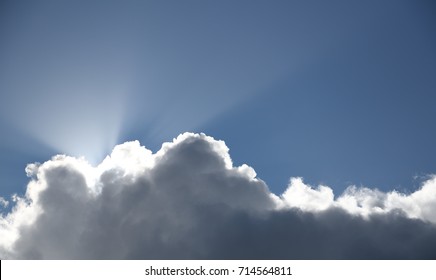Sun Rays Shining Behind Thick Cloud Stock Photo 714564811 | Shutterstock