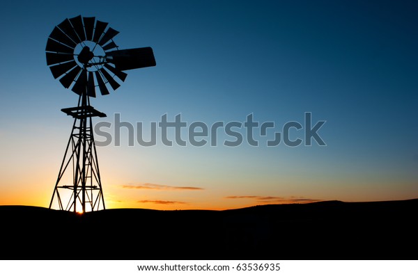 Sun Rises Behind Windmill Stock Photo 63536935 | Shutterstock