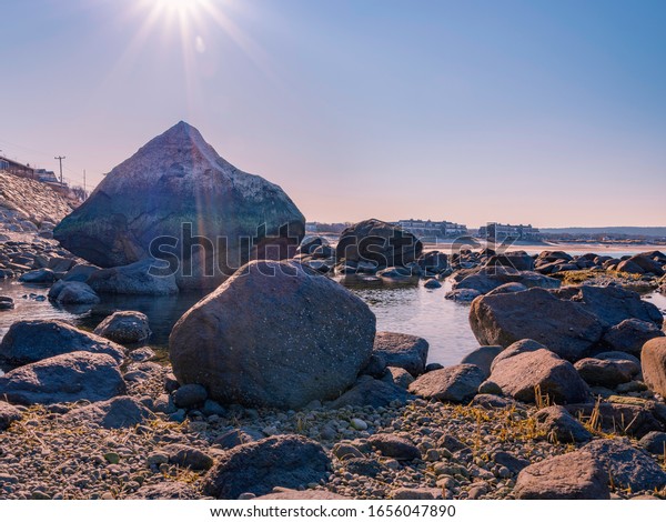 Sunbeam Over Large Triangular Shaped Boulder Stock Photo 1656047890 ...