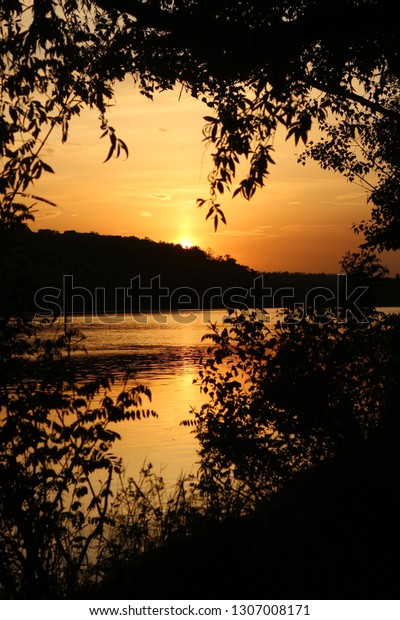 Sunset By River Stock Photo 1307008171 | Shutterstock