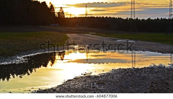 Sunset Over Meadow Stream Masts Water Stock Photo (Edit Now) 604877006