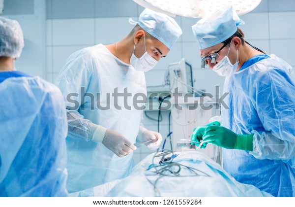 Surgeons Performing Complex Surgery Intensive Care Stock Photo (Edit ...