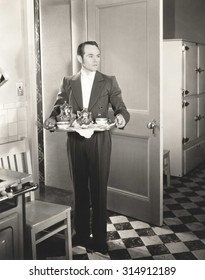 249 Butler serving tea Images, Stock Photos & Vectors | Shutterstock