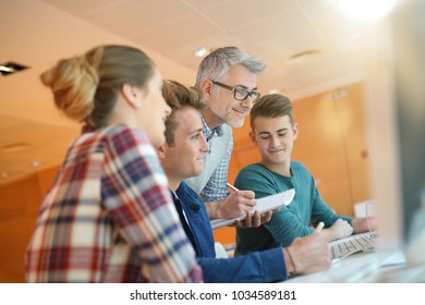 Teacher Controlling Students Work Class Stock Photo 1034589193 ...