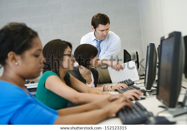 Teacher Helping Student Computer Lab Stock Photo (Edit Now) 152123315