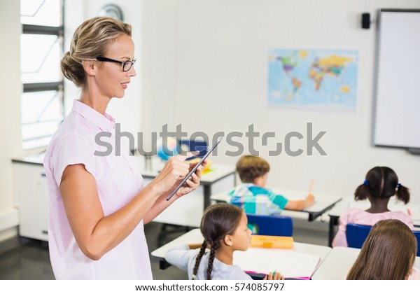 Teacher Using Digital Tablet Classroom Stock Photo (Edit Now) 574085797