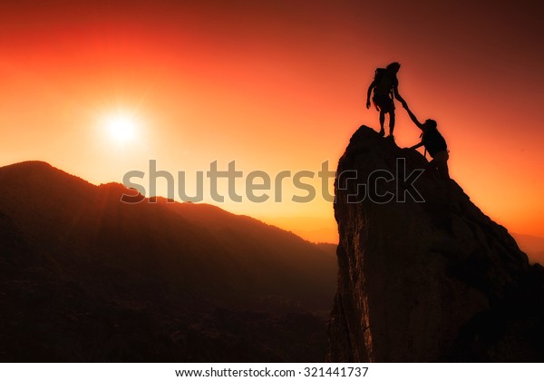 Team Climbers Help Conquer Summit Teamwork Stock Photo (Edit Now) 321441737