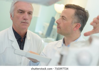 Team Doctors Discuss Stock Photo 710397724 | Shutterstock