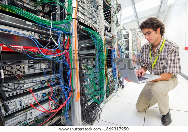 Technician Kneeling Server Room Data Center Stock Photo 1869317950 ...