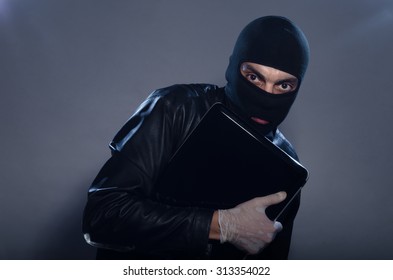 Thief Stealing Laptop Computer Isolated On Stock Photo (Edit Now) 651025117