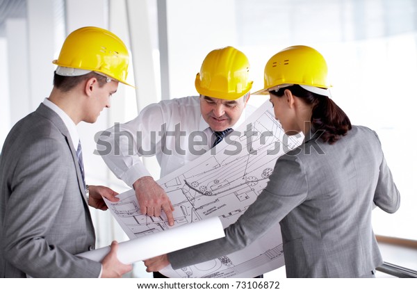 Three Architects Looking Project Discussing Stock Photo 73106872 ...