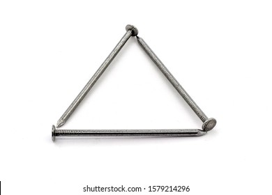 Three Construction Nails Form Triangle On Stock Photo 1579214296 ...