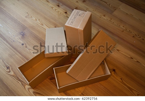 Three Empty Shoe Boxes On Wooden Stock Photo (Edit Now) 62392756