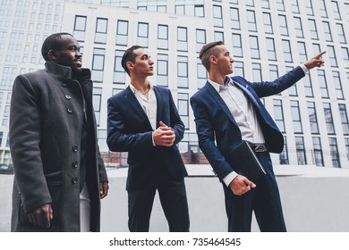 Three Men Stand Background Skyscraper City Stock Photo 735464545 ...