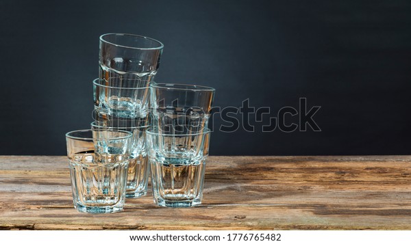 Three Stacks Empty Drinking Glasses Stand Stock Photo (Edit Now) 1776765482