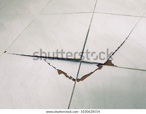 Tile Floor Exploded Cracked Because Used Stock Photo (Edit Now) 1030628554