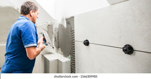 Tiler Installing Large Format Tile On Stock Photo 1566309985 | Shutterstock