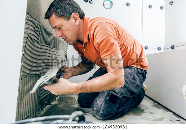 Tiler Installing Large Format Tile On Stock Photo 1649530981 | Shutterstock