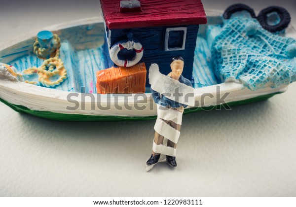 Tiny Wrapped Figurine Man Model Beside Stock Photo 1220983111 ...