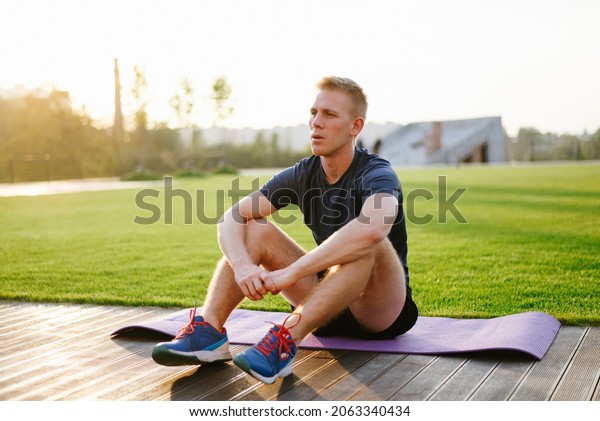 Tired Guy Resting After Exercise Workout Stock Photo 2063340434 ...