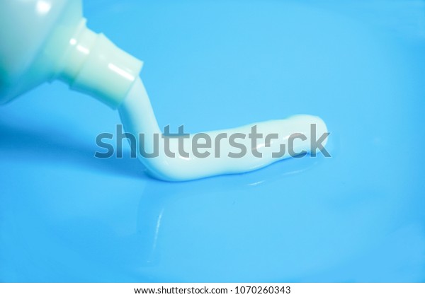 Toothpaste Light Blue Background Stock Photo 1070260343 | Shutterstock