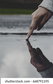 387 Finger touching water ripples Images, Stock Photos & Vectors ...