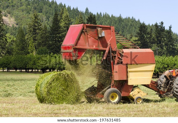 Tractor Pulling Large Round Baler Pick Stock Photo (Edit Now) 197631485