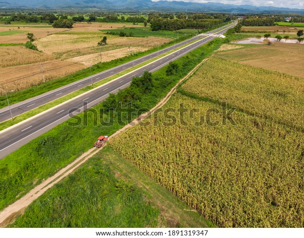 Tractor Running Through Empty Crop Field Stock Photo 1891319347 ...