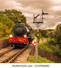 Train Chugging Down Track Stock Photo 1215904600 | Shutterstock