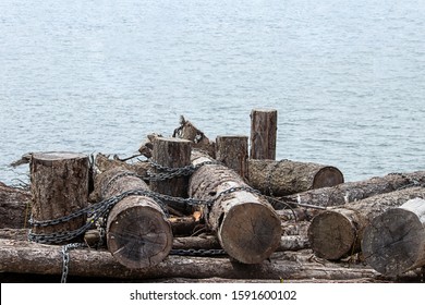 Tree Trunks Bound Together Chains Floating Stock Photo 1591600102 ...