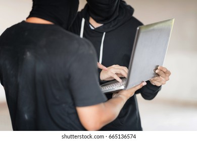 Two Black Masked Hackers Using Laptop Stock Photo 665136574 | Shutterstock