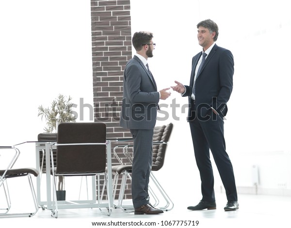 Two Business Executives Talking About Business Stock Photo 1067775719 ...