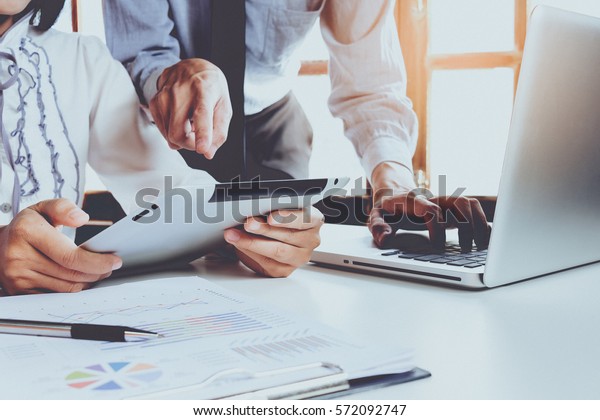 Two Colleagues Discussing Data Tablet New Stock Photo 572092747 ...